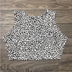 PrettyLittleThing | Tops | White Jersey Leopard Print Racer Crop Top ...